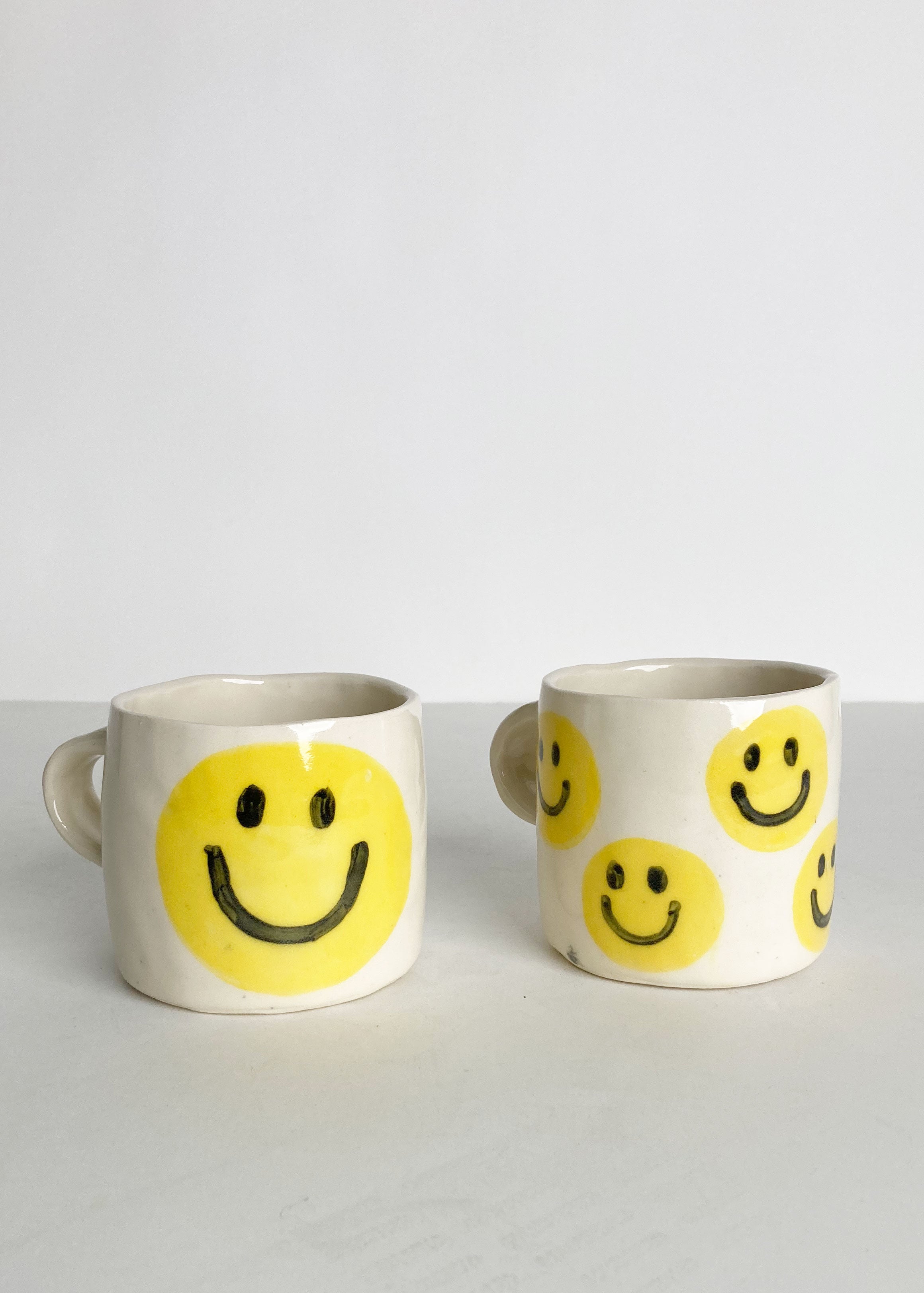 Smiley Mugs by Alice Cheng Studio / A. CHENG